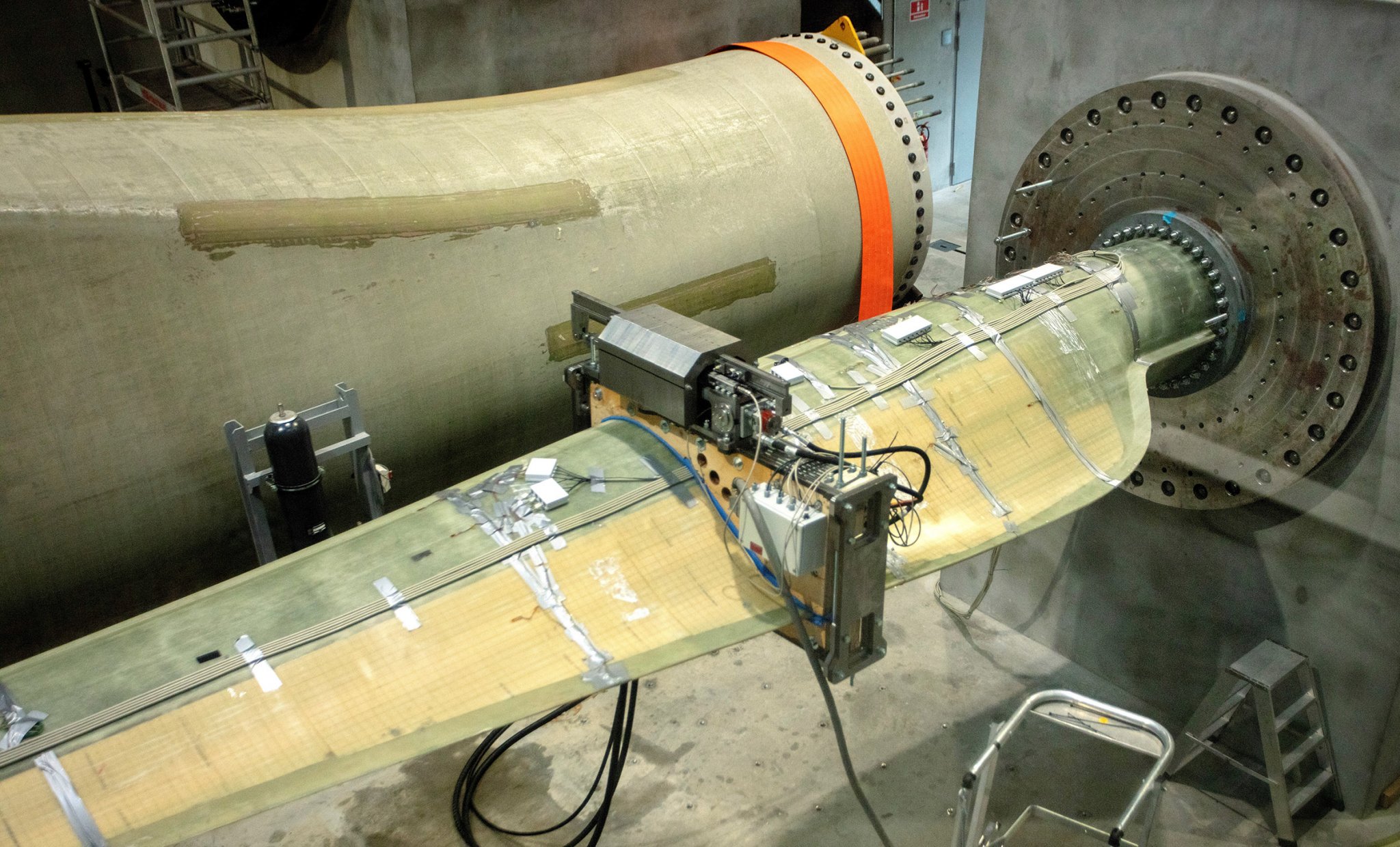 A path to a more realistic testing center for wind turbine blades